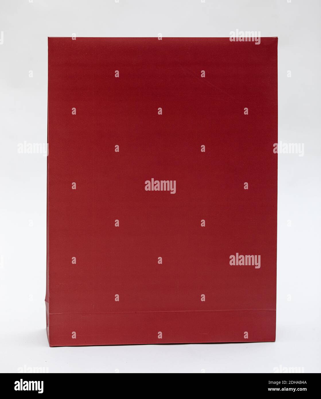 A vertical shot of a red paper bag Stock Photo - Alamy