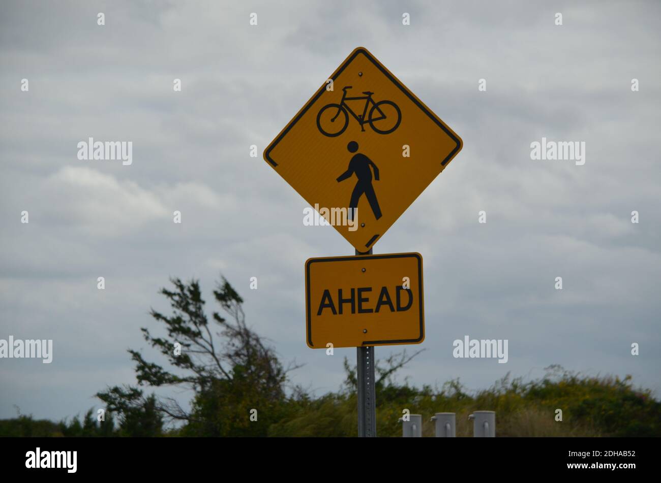 A yellow safety sign Stock Photo - Alamy