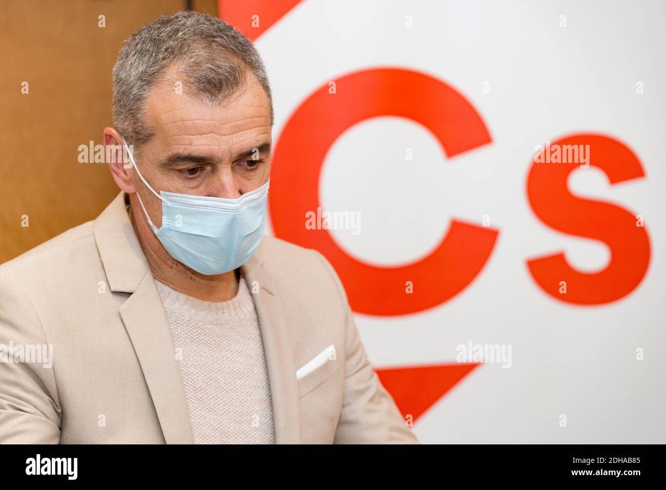 Toni Canto wearing a face mask attends an interview in his office at ...