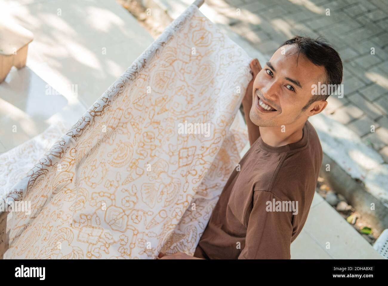 portrait young men see the results of these batik drawings. traditional ...