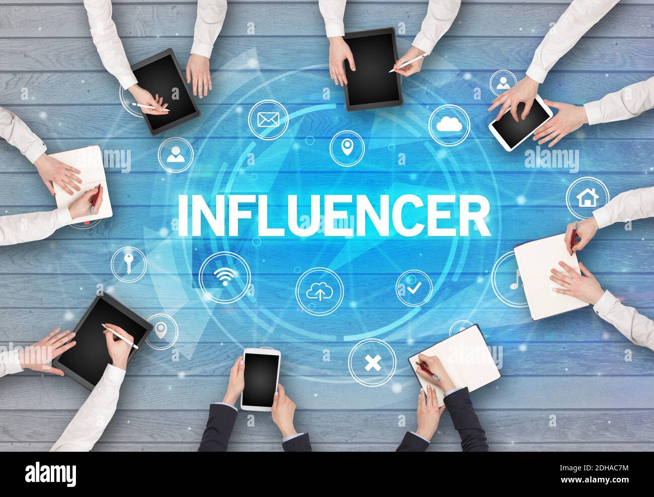 Group of people having a meeting with INFLUENCER insciption, social ...
