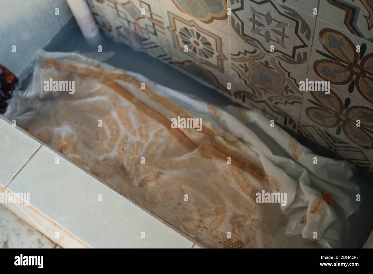 the washing process of the finished batik cloth Stock Photo - Alamy