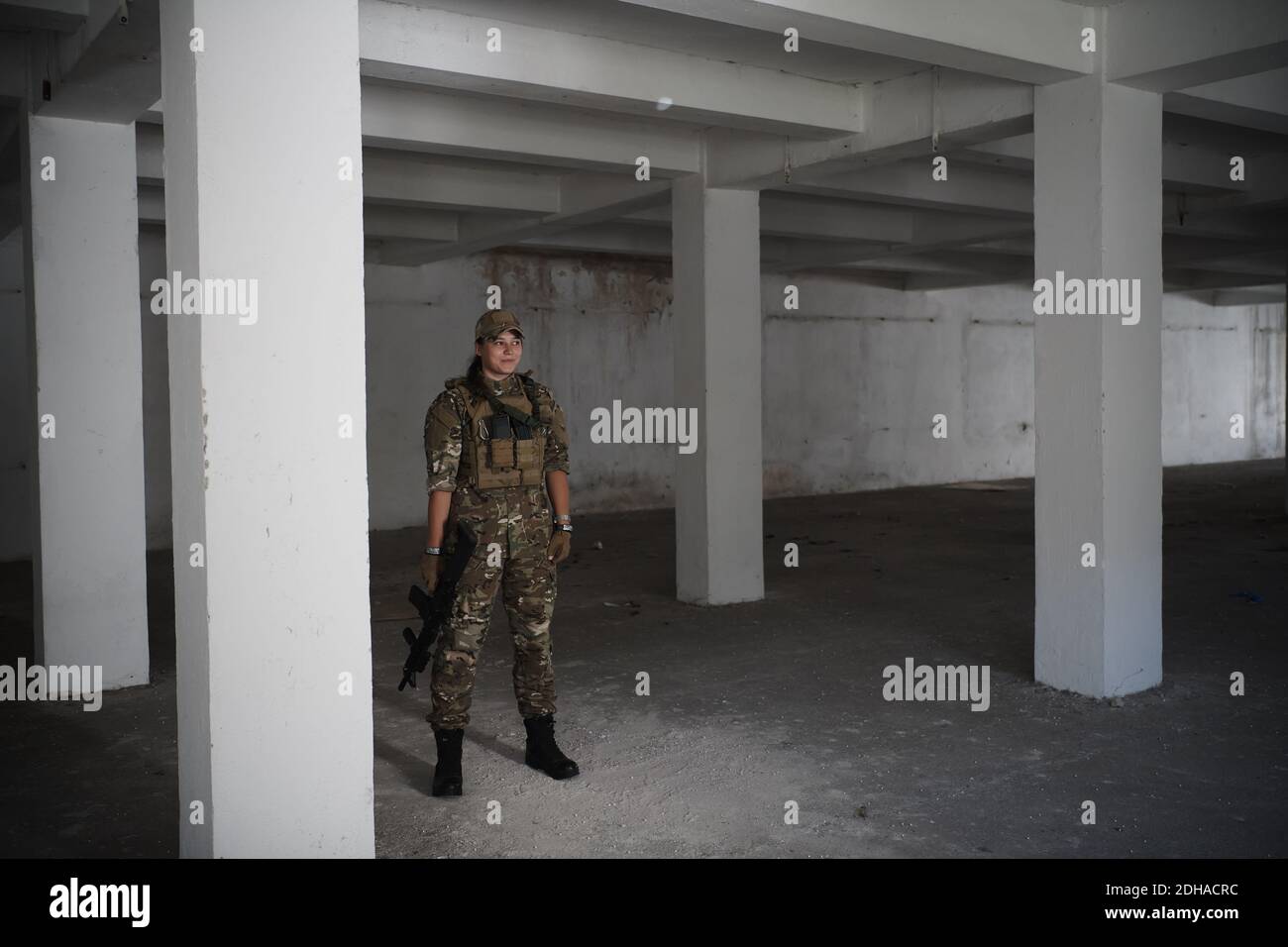 Military female soldier having a break Stock Photo - Alamy