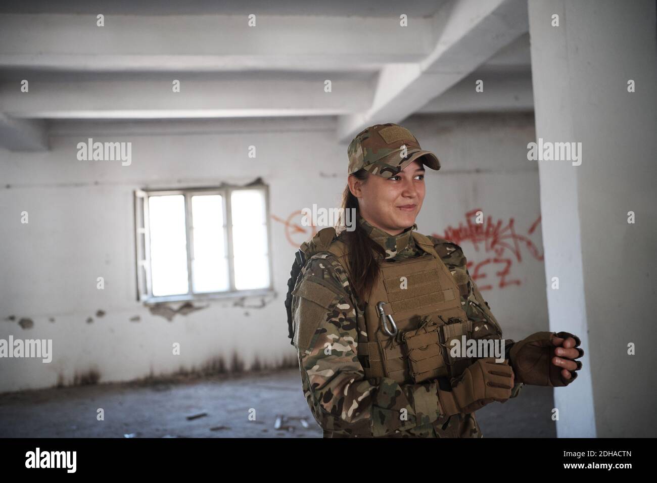 Military female soldier having a break Stock Photo - Alamy