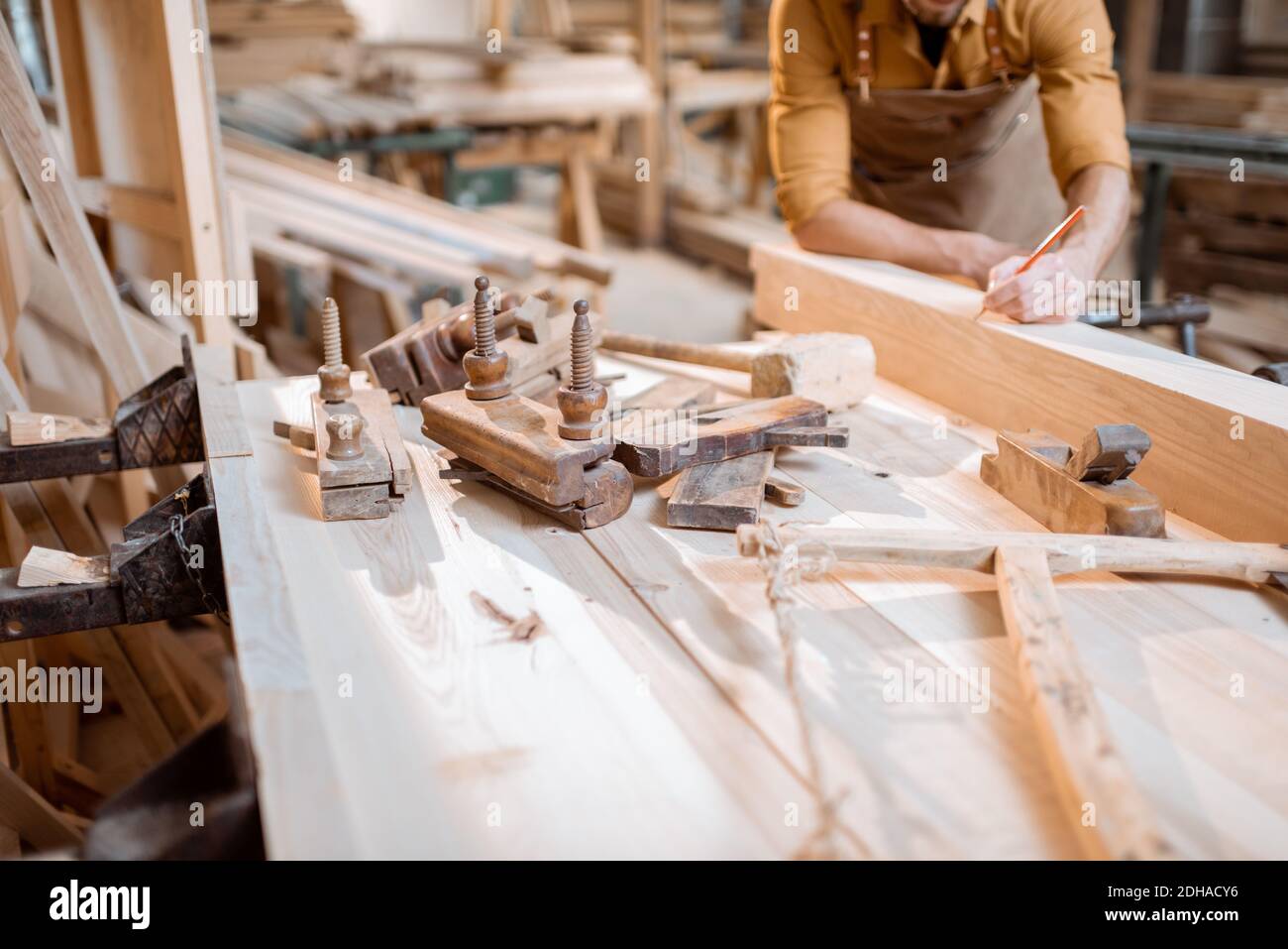 Worker mark pencil on ruler hi-res stock photography and images - Alamy