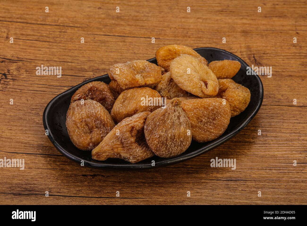 Dry sweet fig fruit heap snack Stock Photo - Alamy