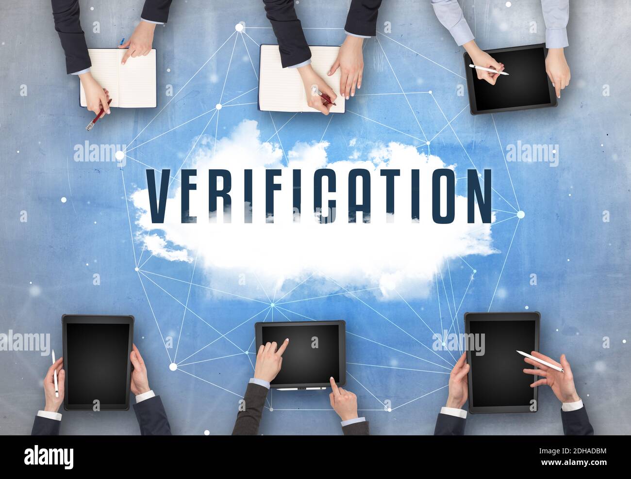 Group of people having a meeting with VERIFICATION insciption, web ...
