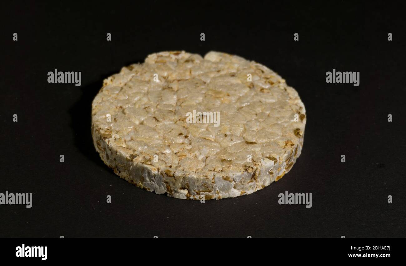 Grain crispbreads crispy rice and diet bread. Stack of puffed whole ...