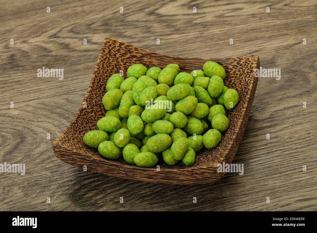 Spicy wasabi peanuts snack in the bowl Stock Photo - Alamy
