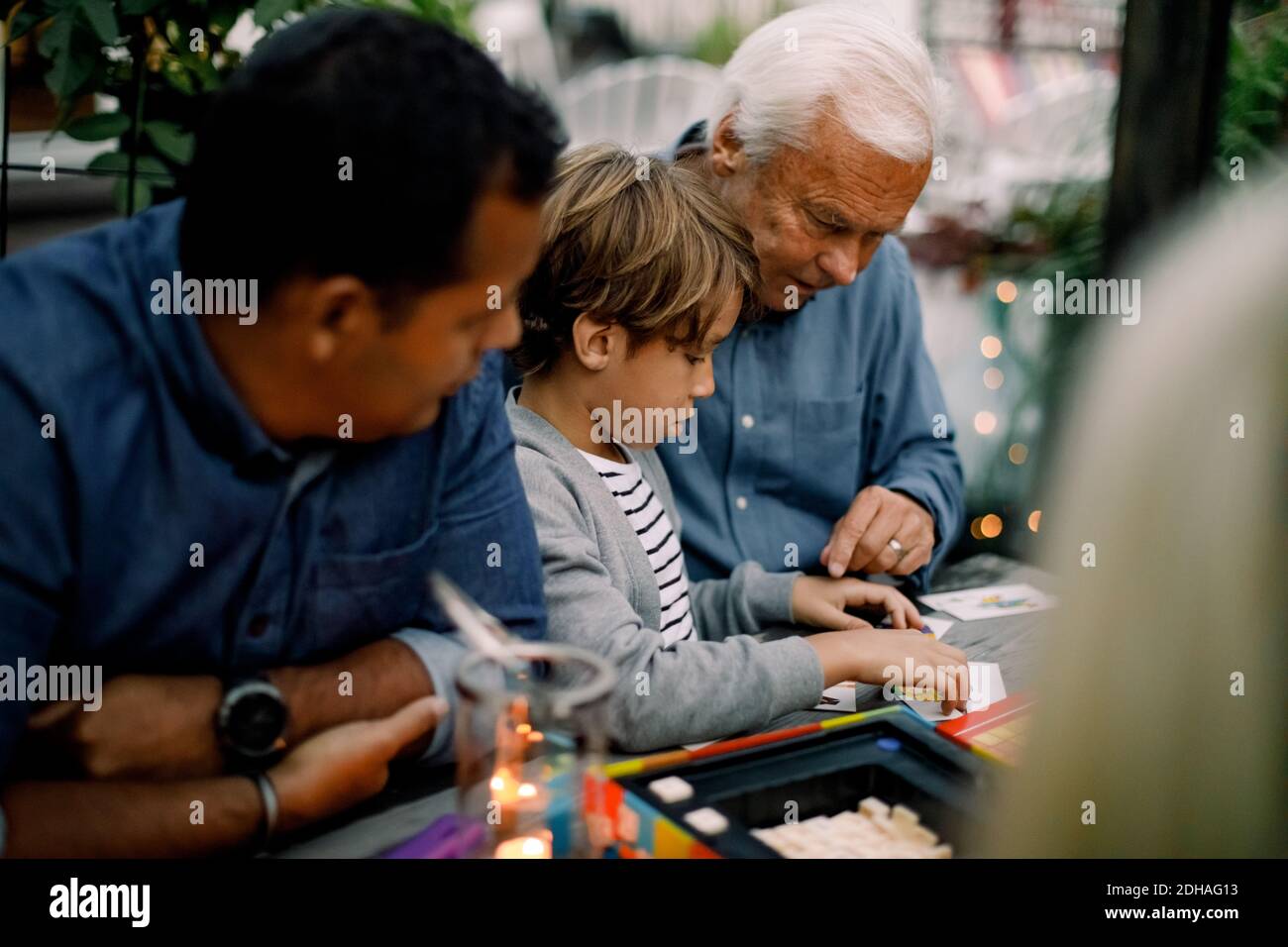 Children playing game table hi-res stock photography and images - Alamy