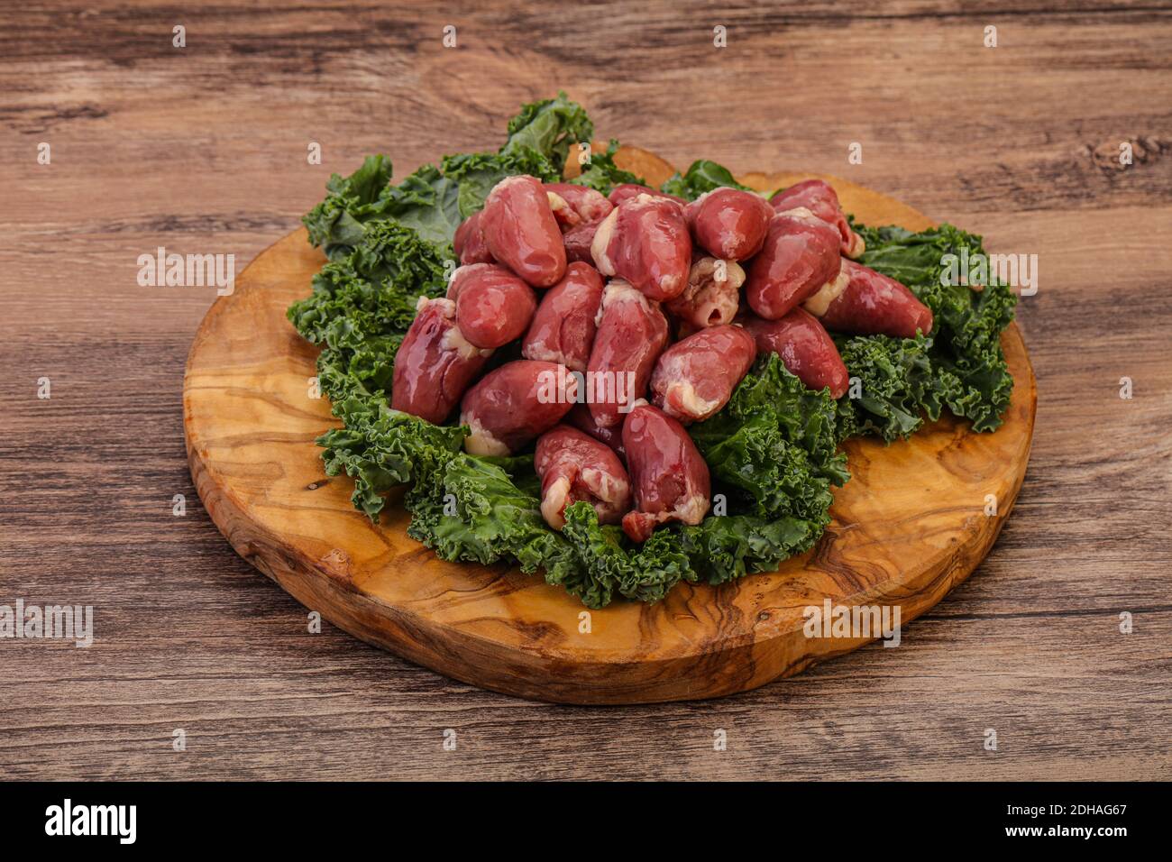 Raw chicken hearts heap for cooking Stock Photo - Alamy