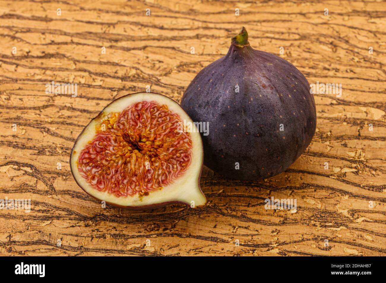 Sweet purple slice of fig fruit Stock Photo - Alamy
