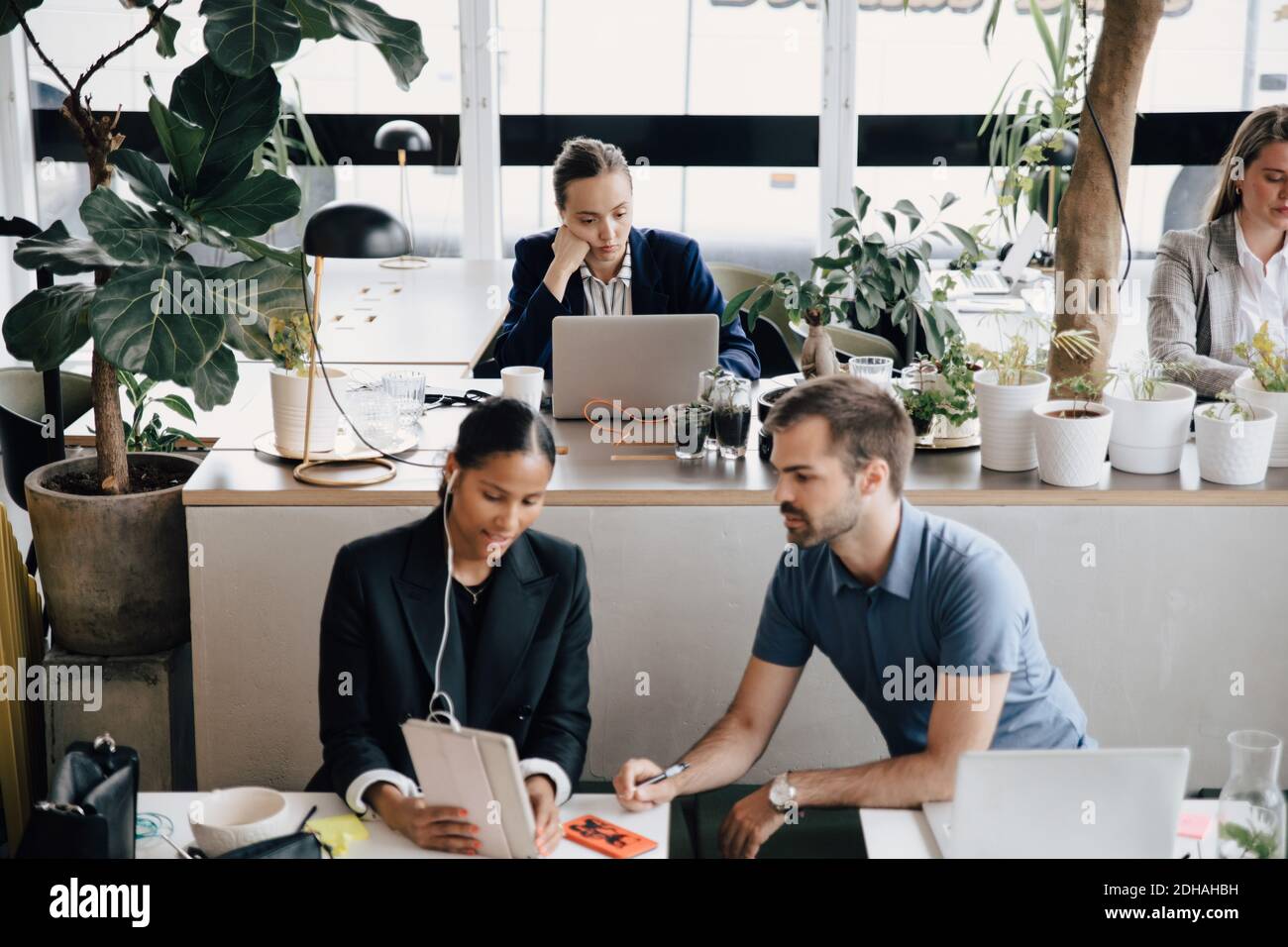 Colleagues laptop digital tablet hi-res stock photography and images ...