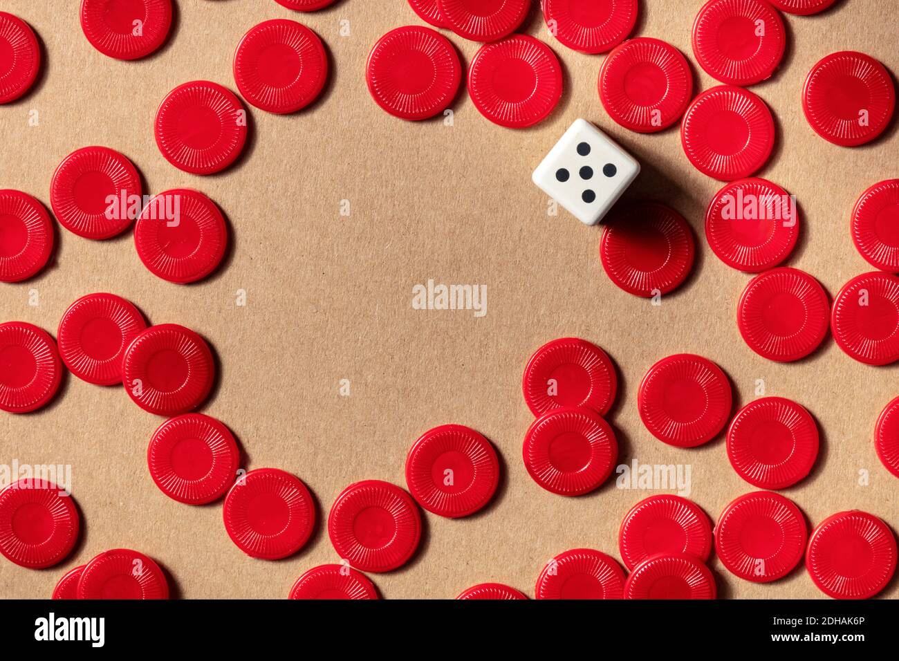 Board games frame with a place for text, top shot of red pieces and a ...