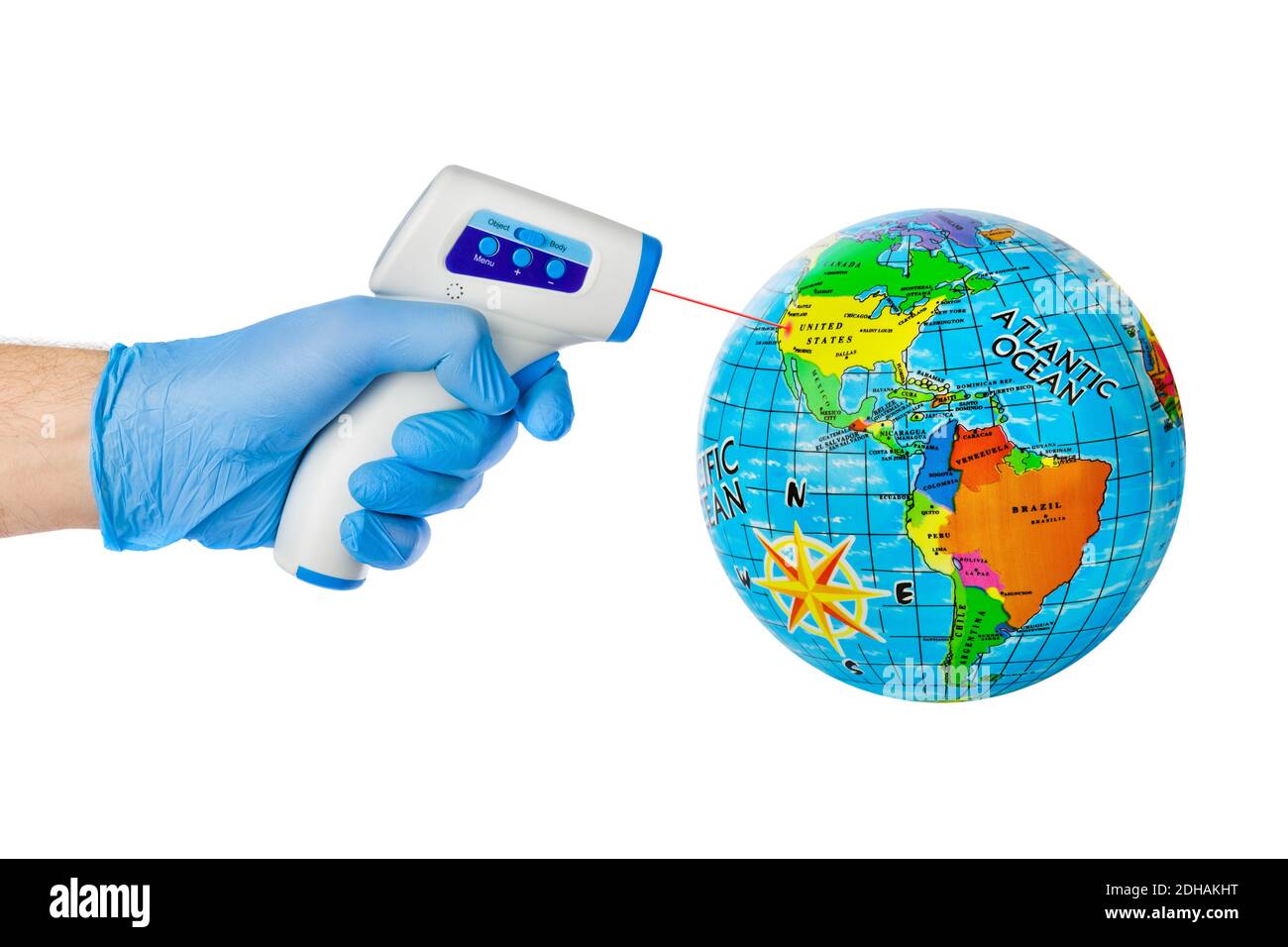 Hand with infrared thermometer and globe Stock Photo - Alamy