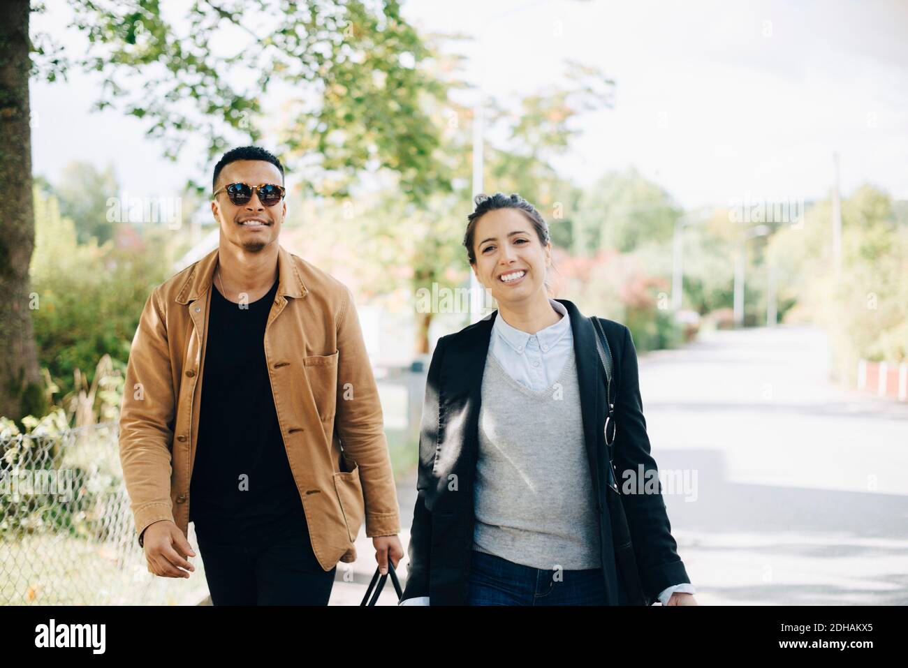 Two friends talking in street hi-res stock photography and images - Alamy