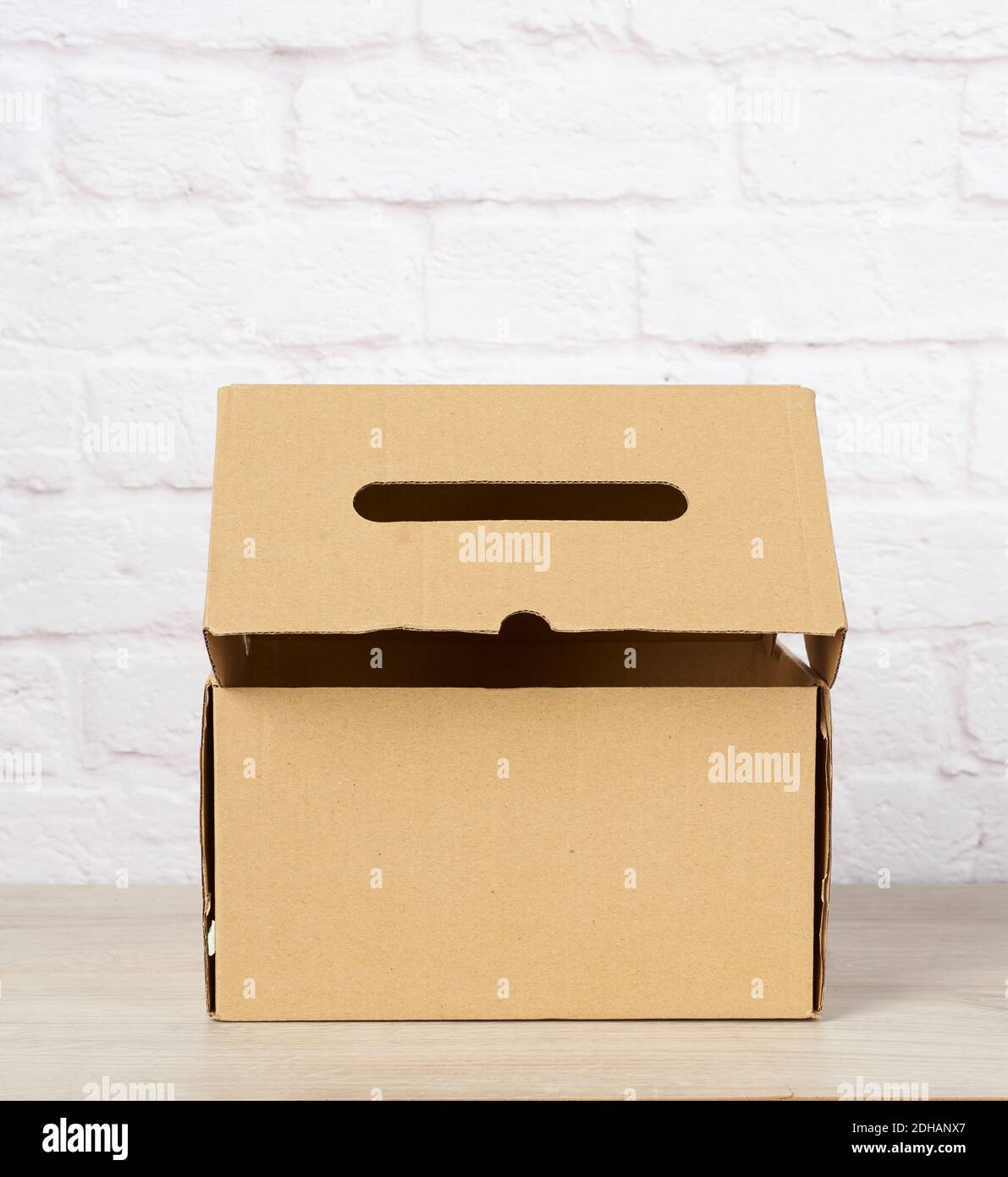 Rectangular box made of brown corrugated cardboard Stock Photo - Alamy