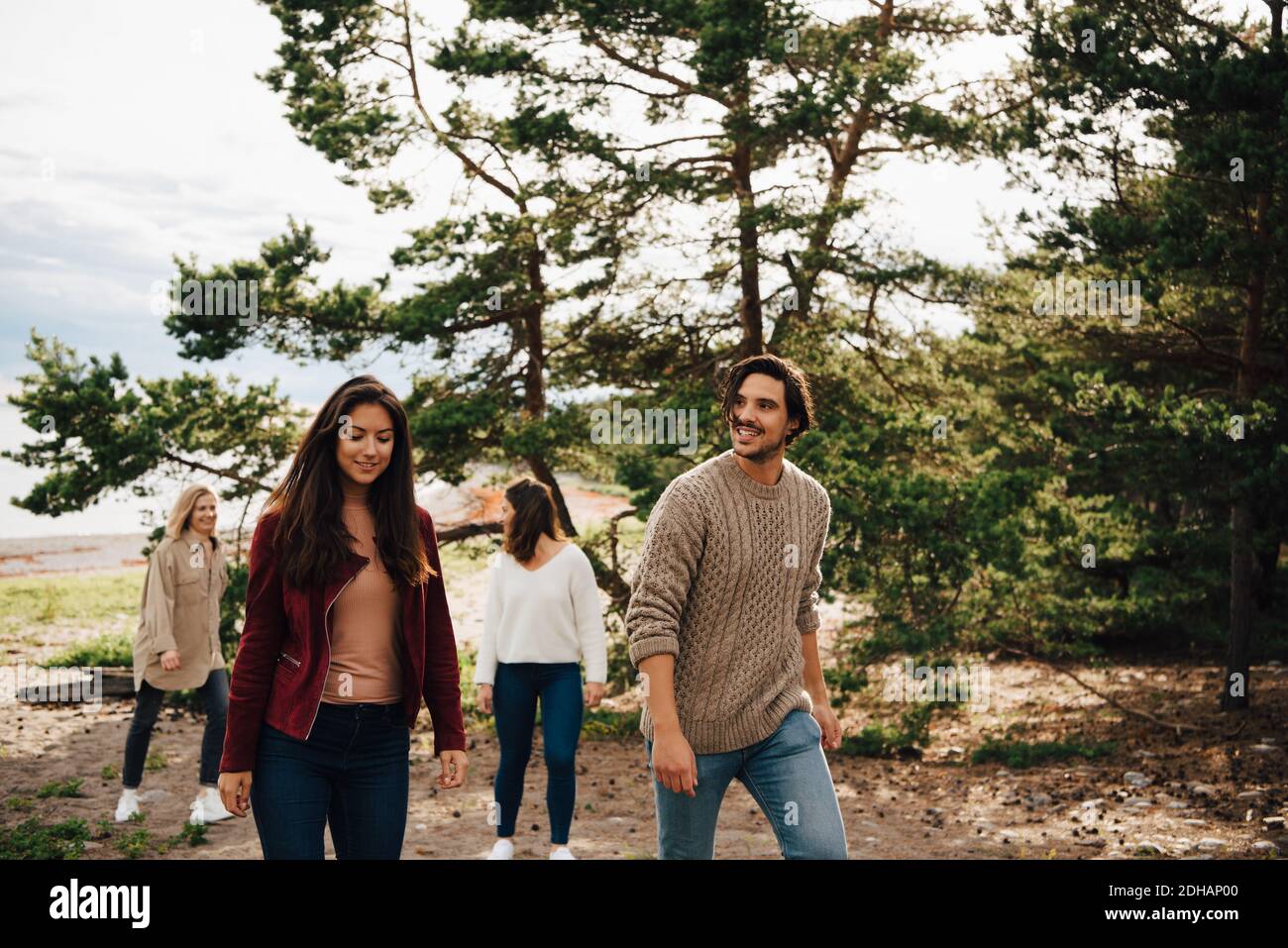 Four friends walking hi-res stock photography and images - Alamy
