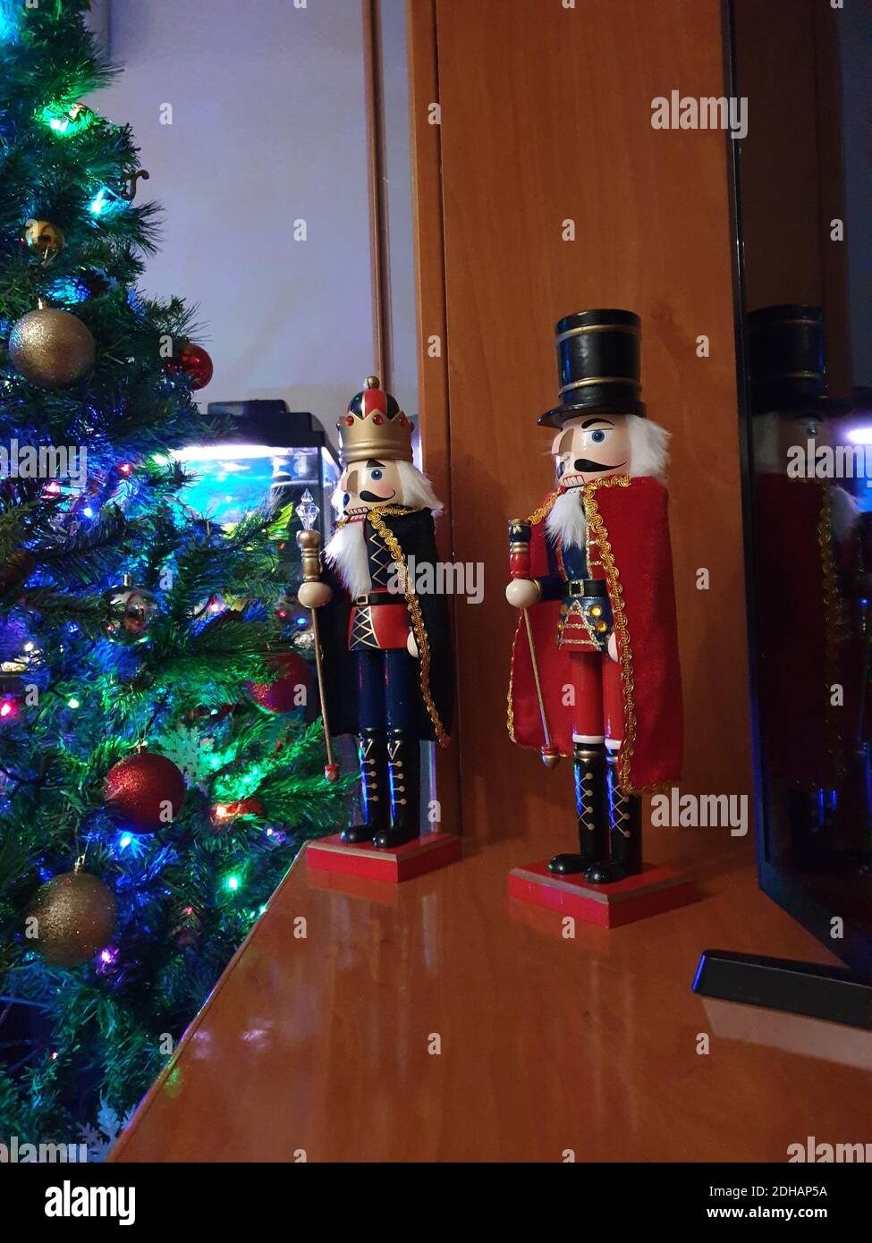 Christmas nutcracker and tree with decorations and lights Stock Photo ...