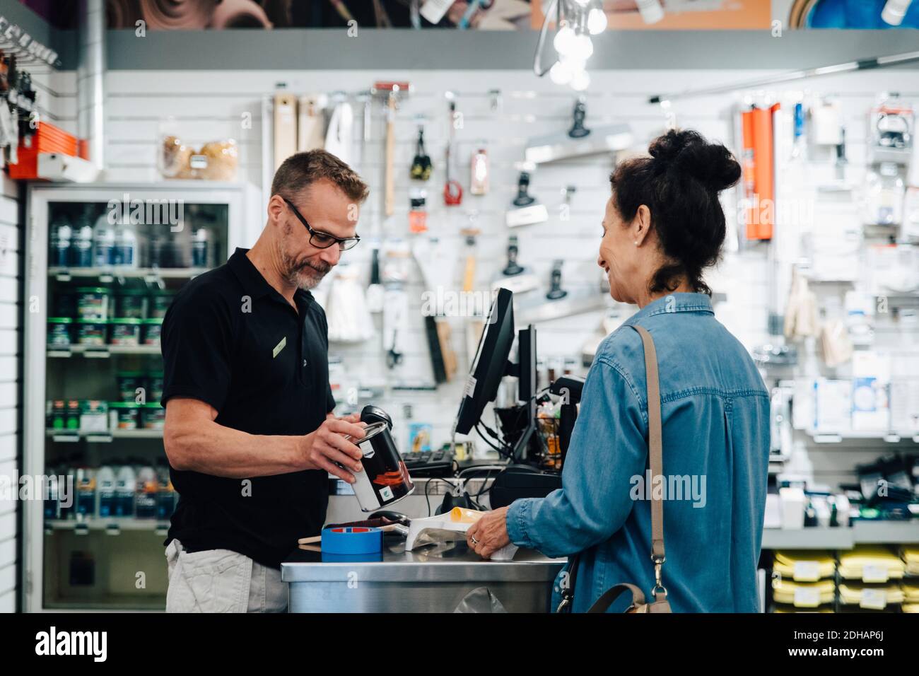 Employee cashier counter hi-res stock photography and images - Alamy