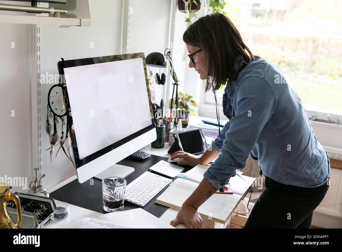 Using computer keyboard side view hi-res stock photography and images ...