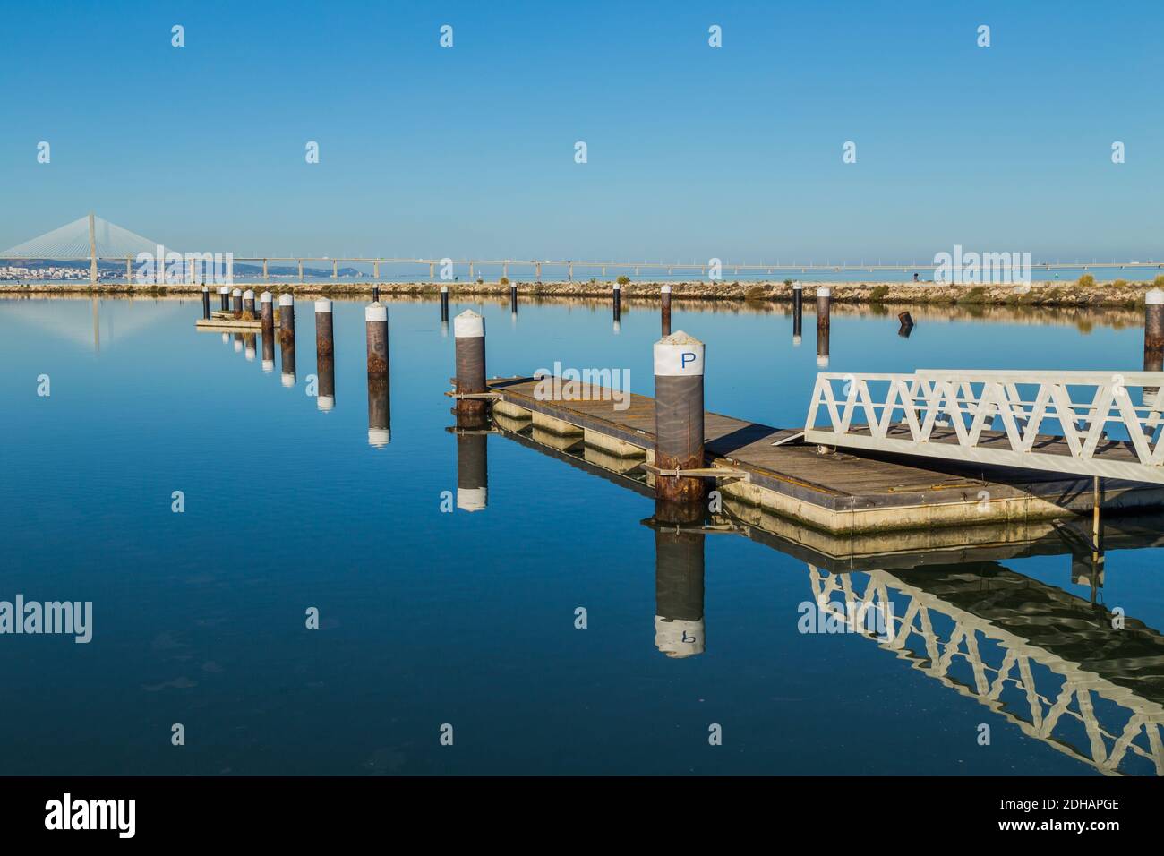Walkway with view on Vasco da Gama bridge on the Tejo river. Lisbon ...