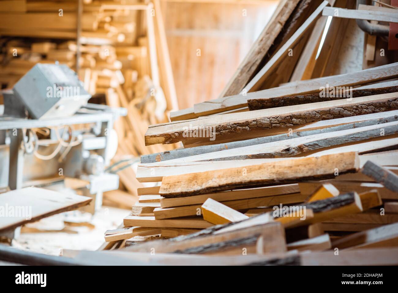 Wood storage with pile of boards at the carpentry Stock Photo - Alamy