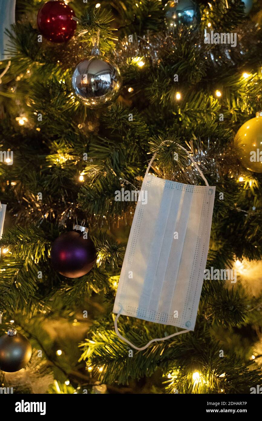 Christmas tree decorated with surgical masks, December 2020 Stock Photo ...