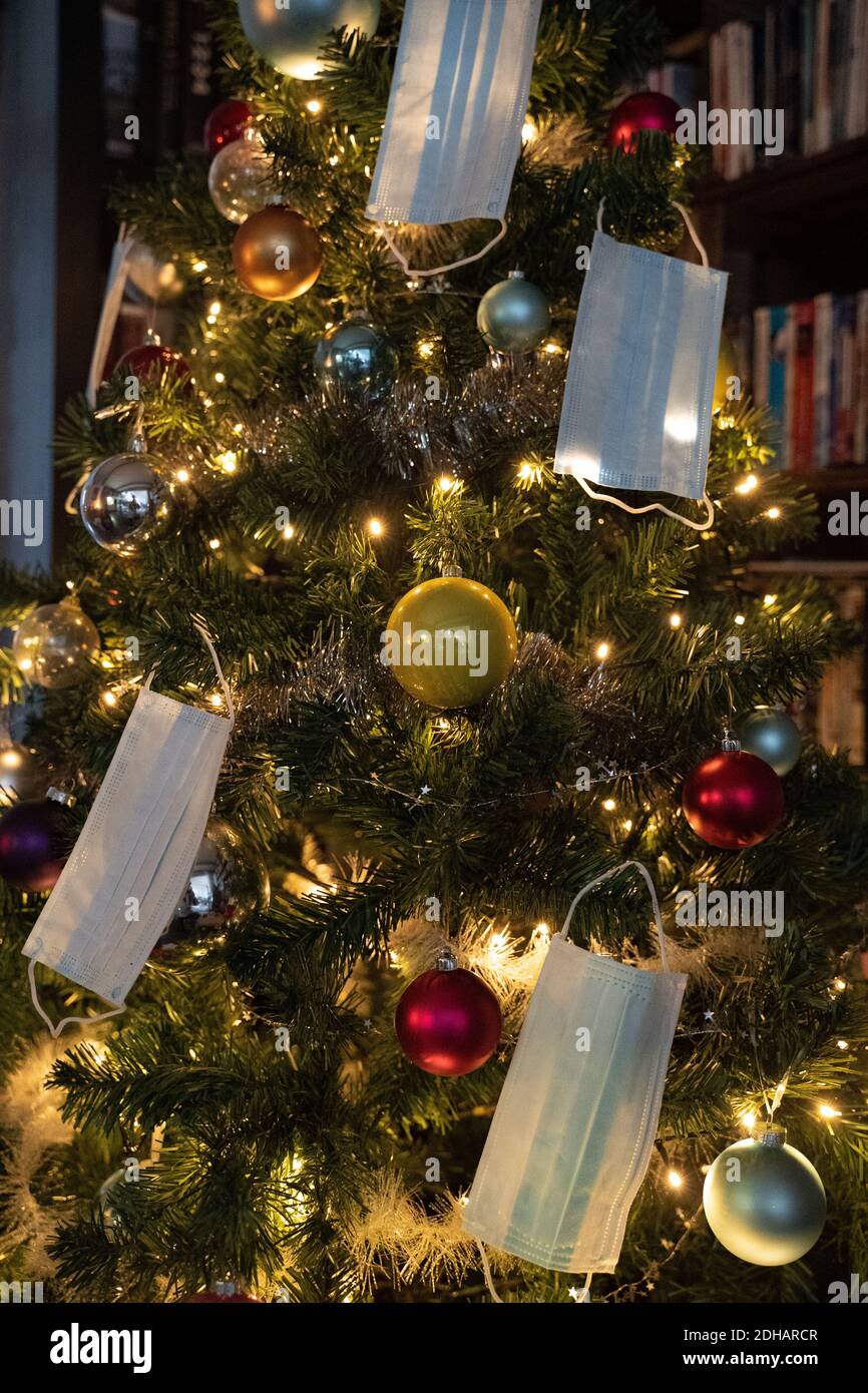 Christmas tree decorated with surgical masks, December 2020 Stock Photo ...