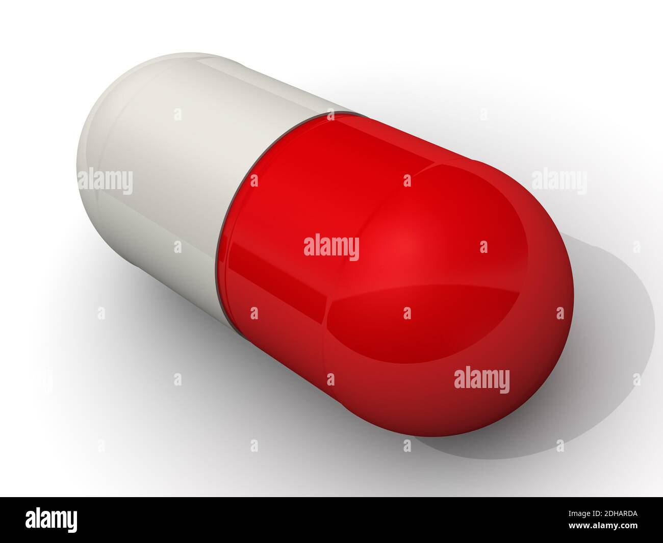 Medical capsule. Red and white medical capsule on white surface ...