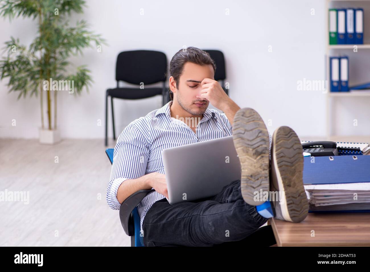 Sad tired male bookkeeper hi-res stock photography and images - Alamy