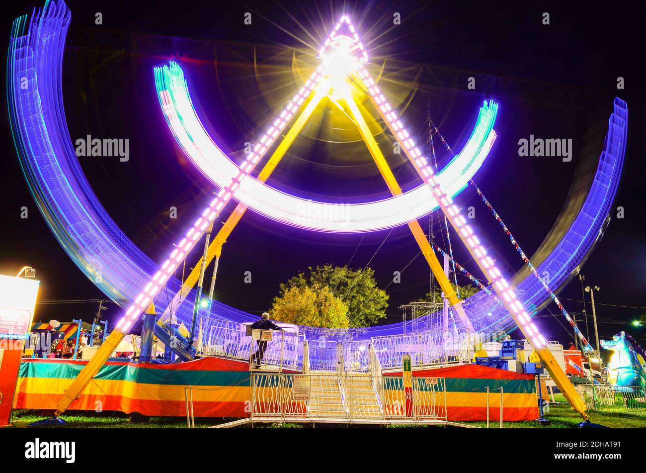 Long Exposure of a pirate ship at a fairground with light trails Stock ...