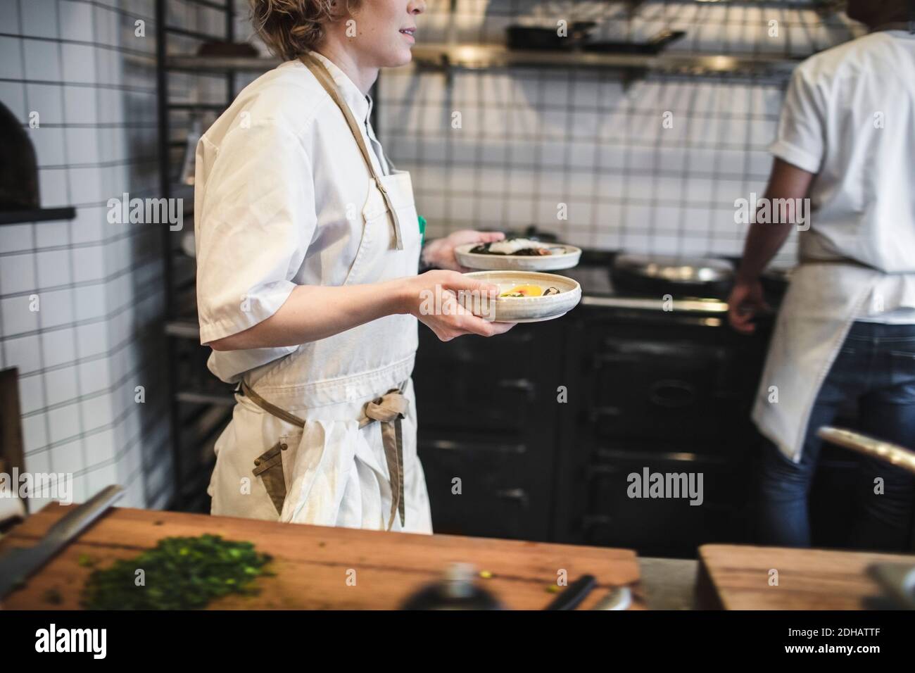 Waiter holding plates foods hi-res stock photography and images - Alamy