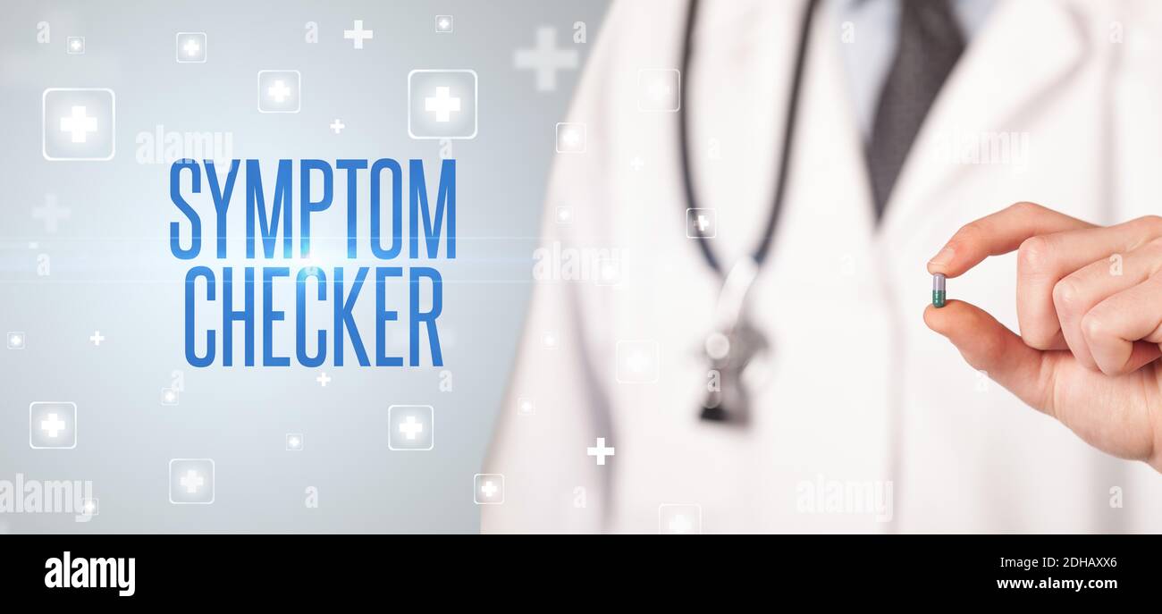Close-up of a doctor giving a pill with SYMPTOM CHECKER inscription ...
