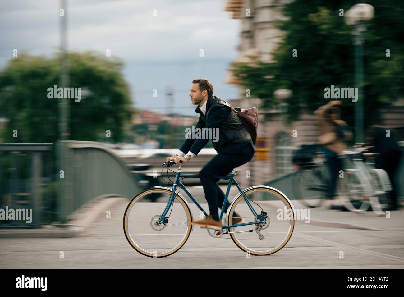 Cycling on bridge hi-res stock photography and images - Alamy