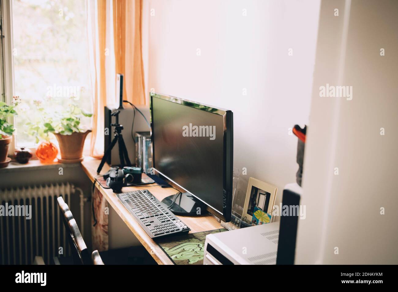 High angle view of computer against wall at home Stock Photo - Alamy