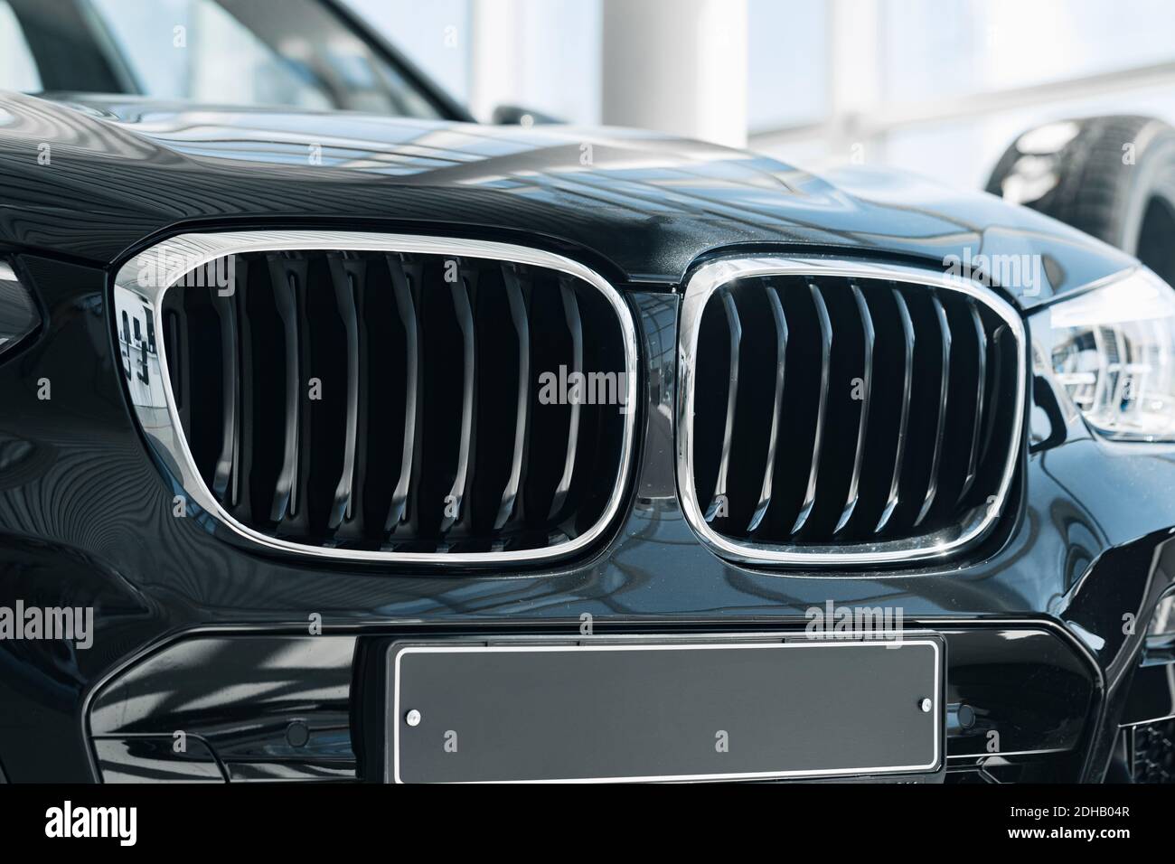 Radiator grille of a new luxury car Stock Photo - Alamy