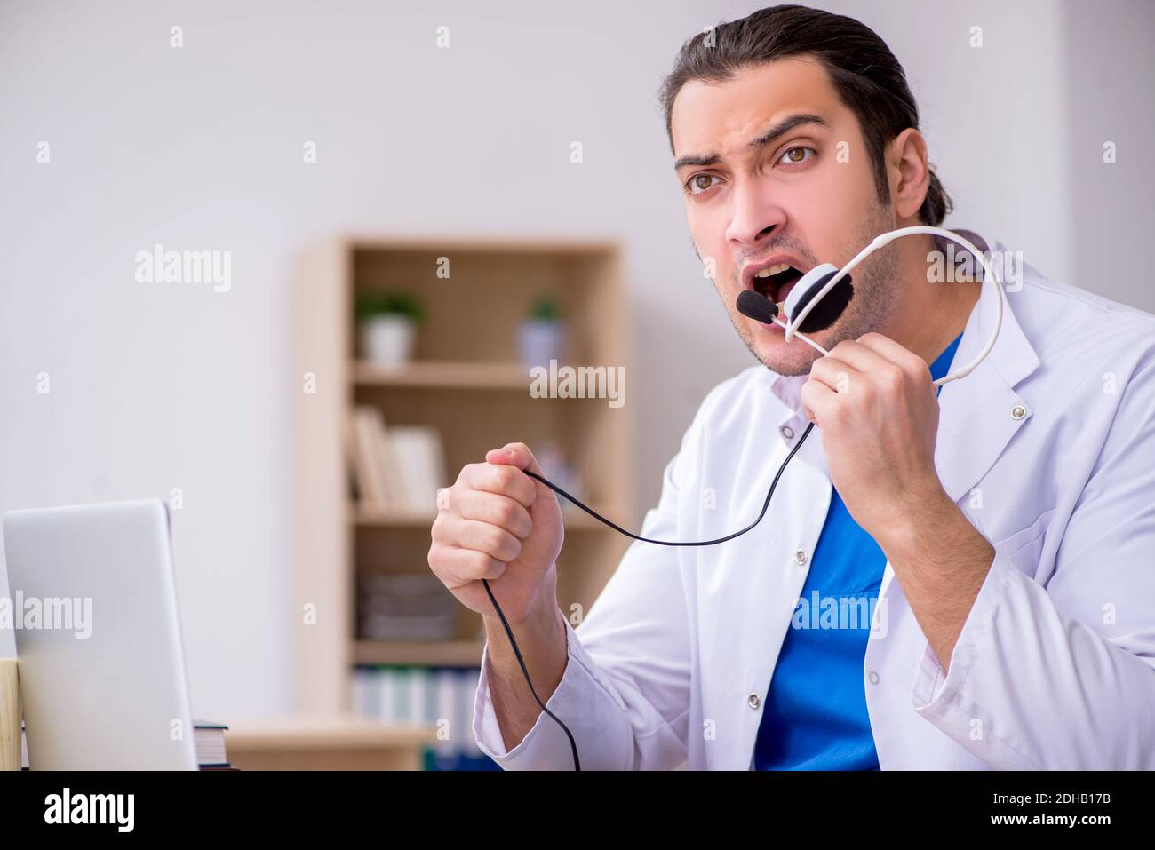 Angry male doctor computer hi-res stock photography and images - Alamy