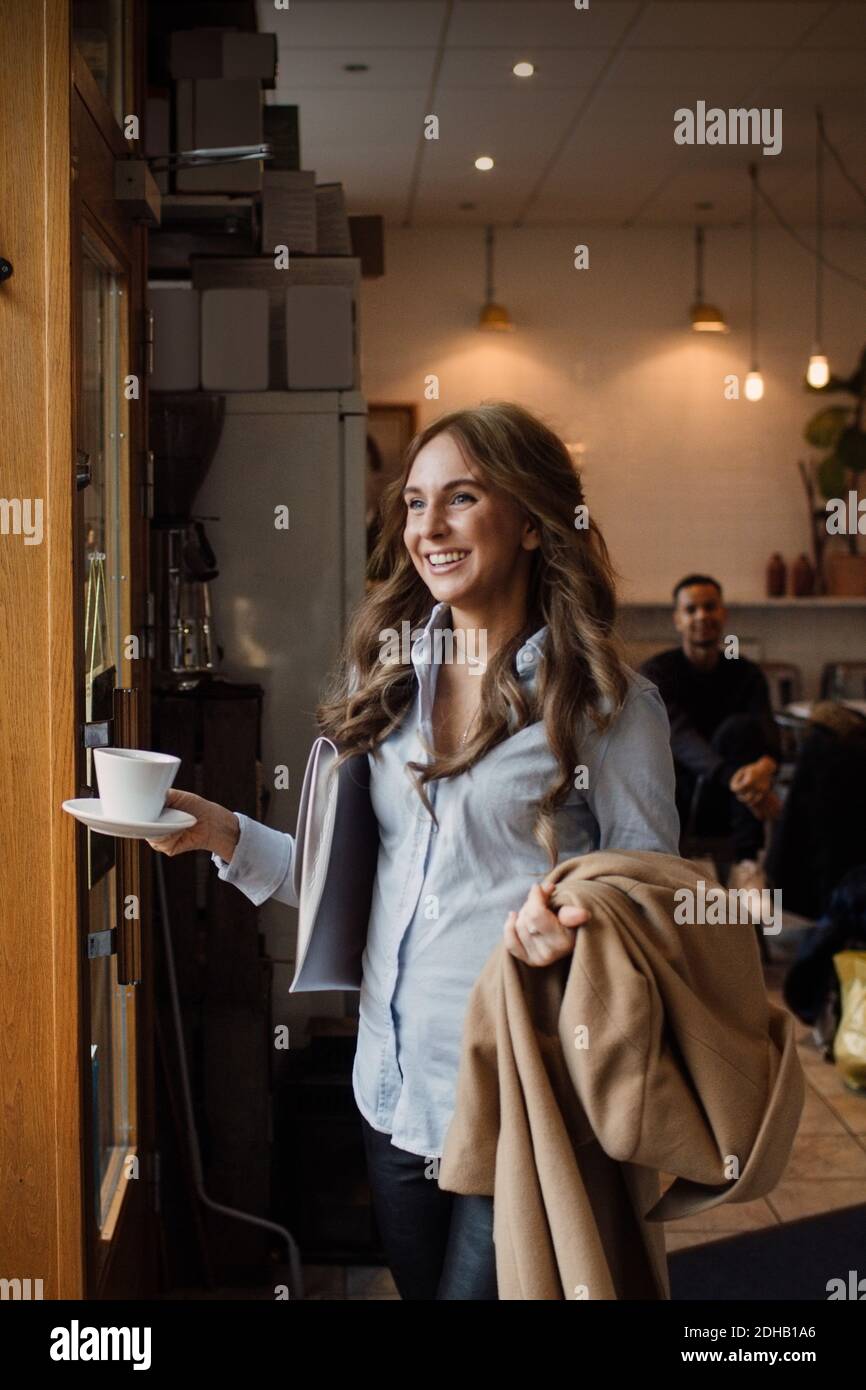 Walking with coffee cup hi-res stock photography and images - Alamy