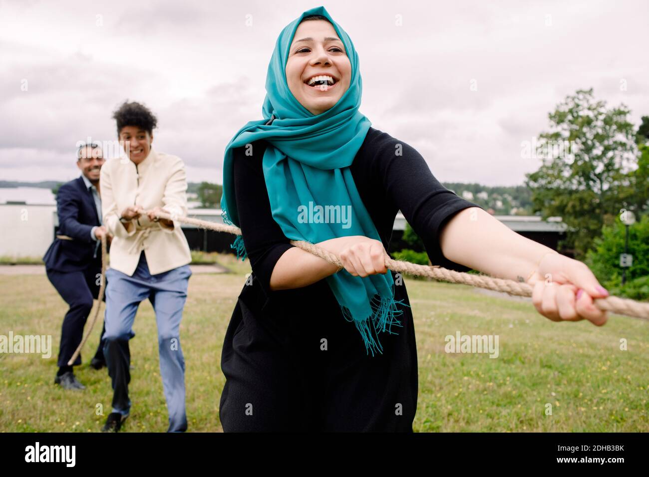 Person pulling rope hi-res stock photography and images - Alamy