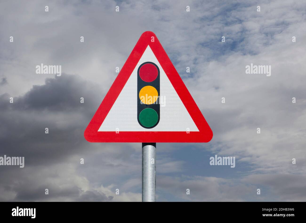 Front view of UK traffic light warning sign against a cloudy sky Stock ...