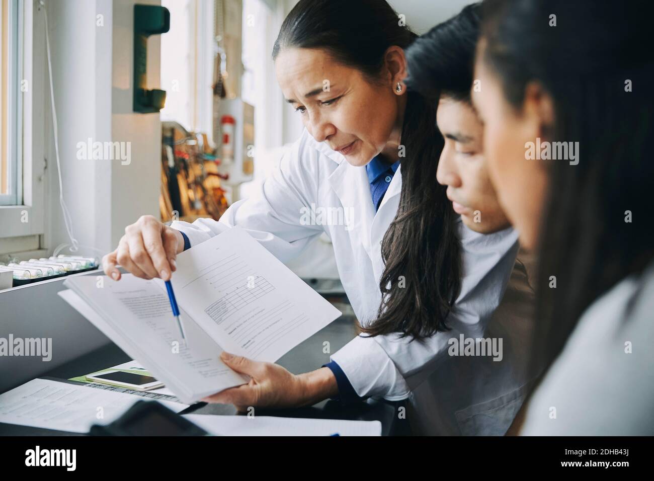 Pointing to book hi-res stock photography and images - Alamy