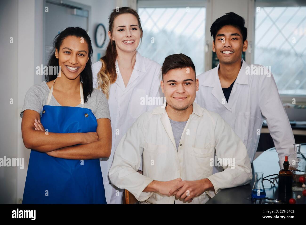 Portrait of confident young multi-ethnic engineering students in ...