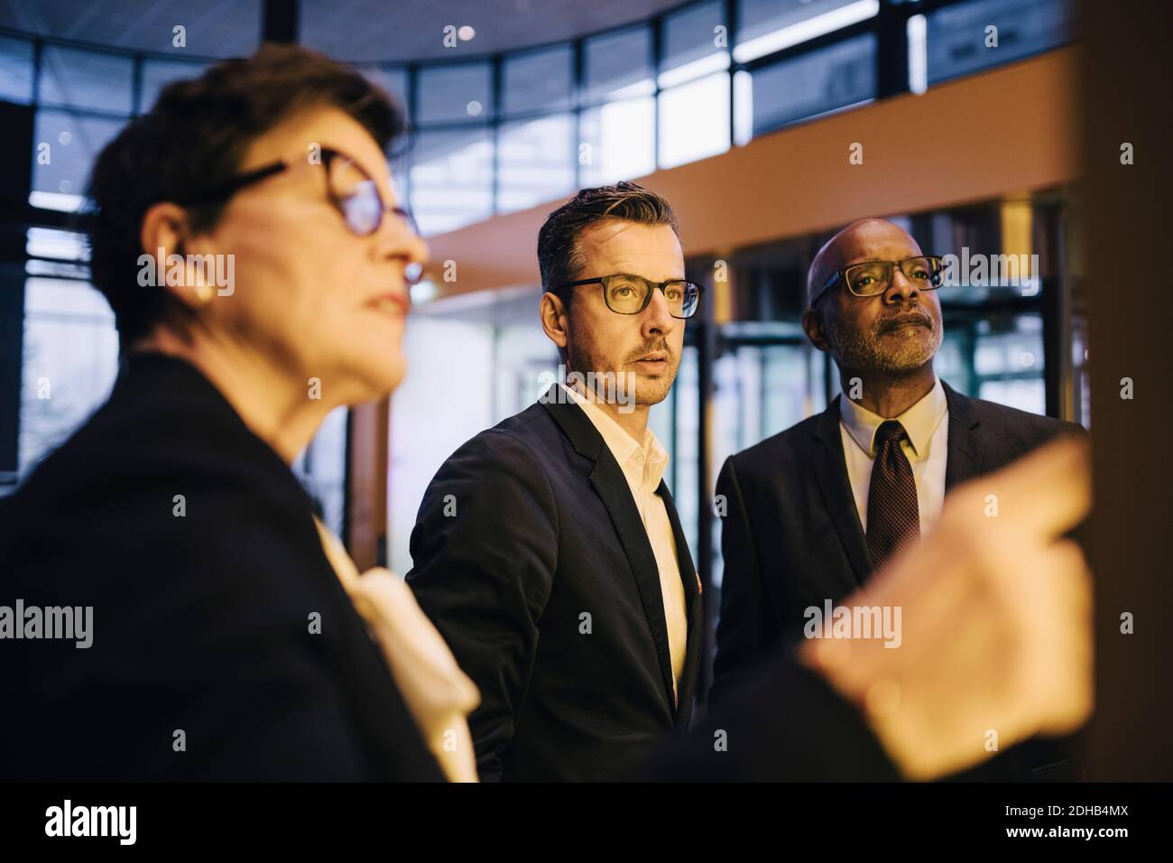 Business colleagues looking while planning at office Stock Photo - Alamy