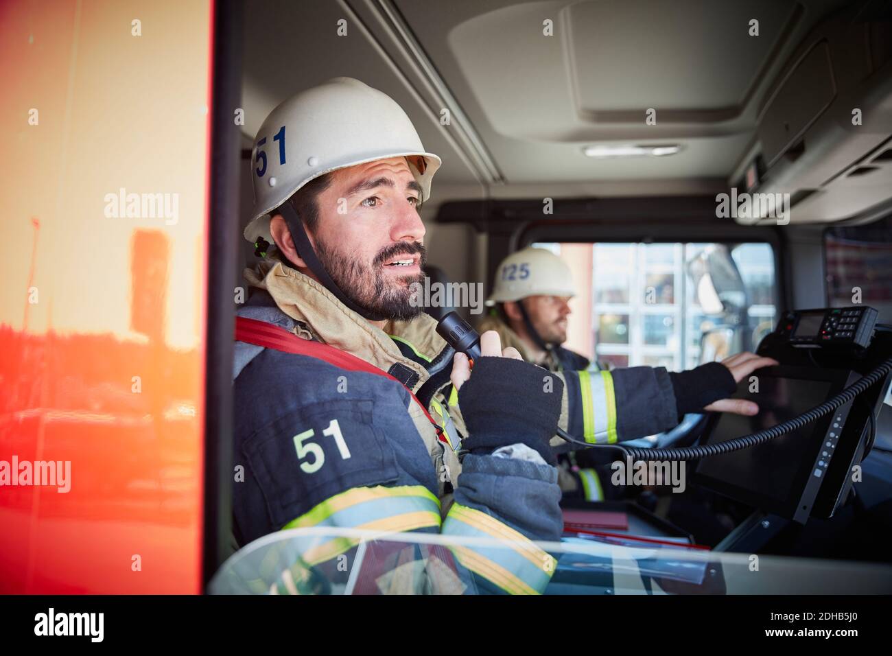 Firefighter talking on microphone hi-res stock photography and images ...