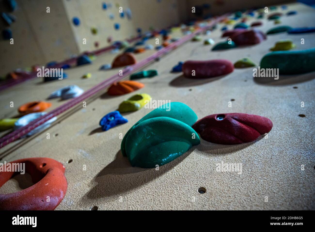 climbing wall with different colored handles in a modern gym Stock ...