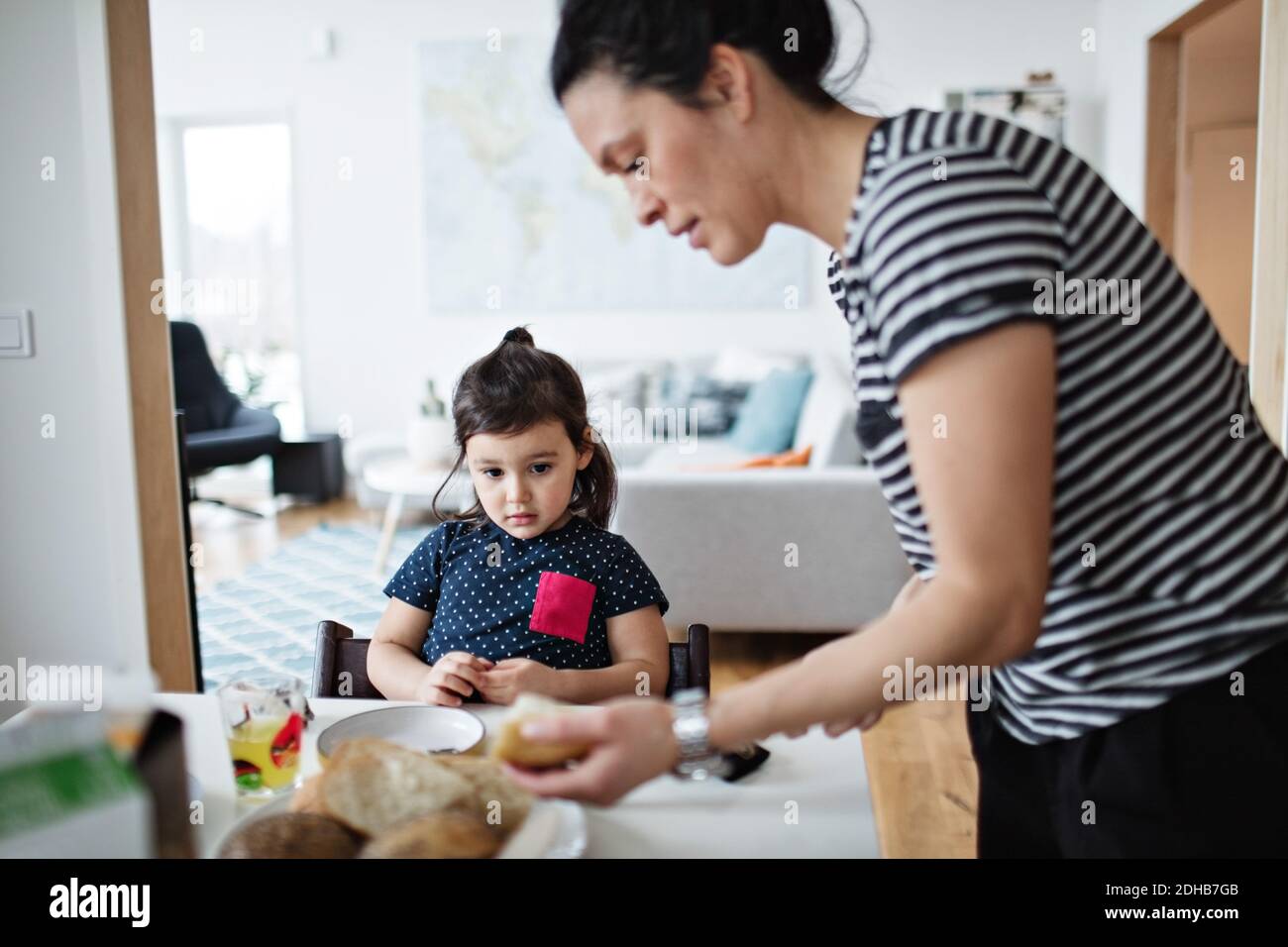Girl serving table hi-res stock photography and images - Alamy