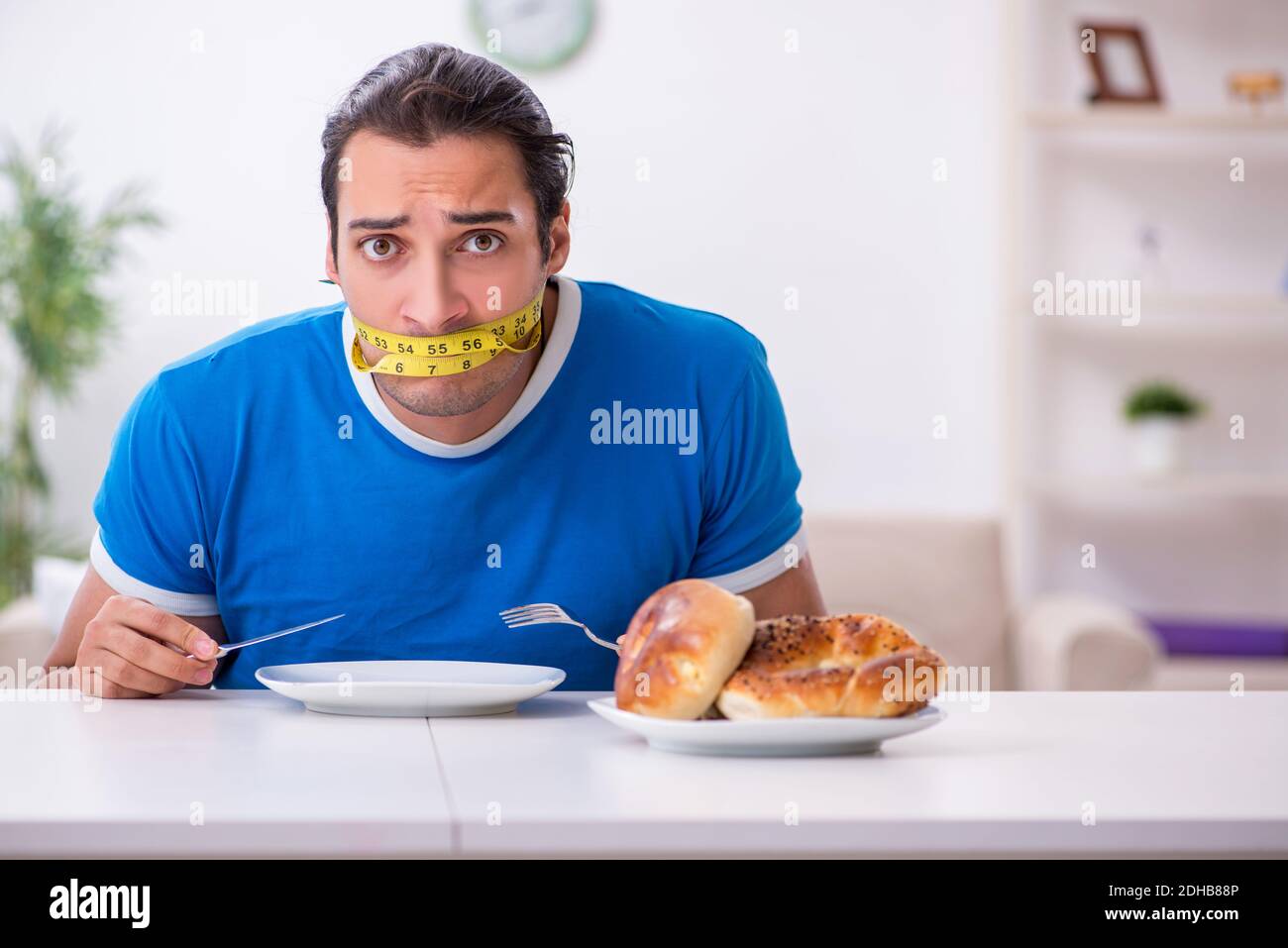 Angry man waiting food in hi-res stock photography and images - Alamy