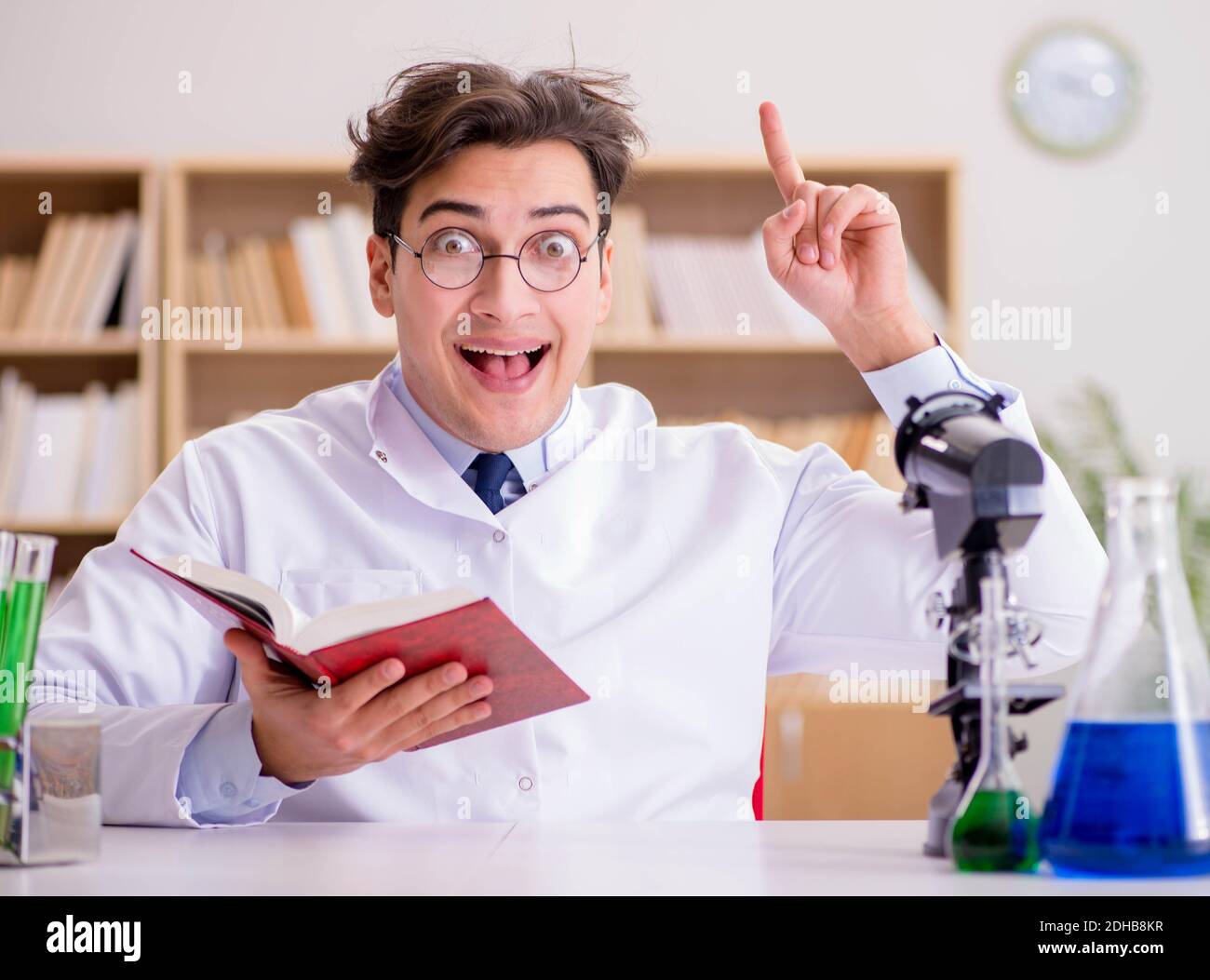 Mad crazy scientist doctor doing experiments in a laboratory Stock ...