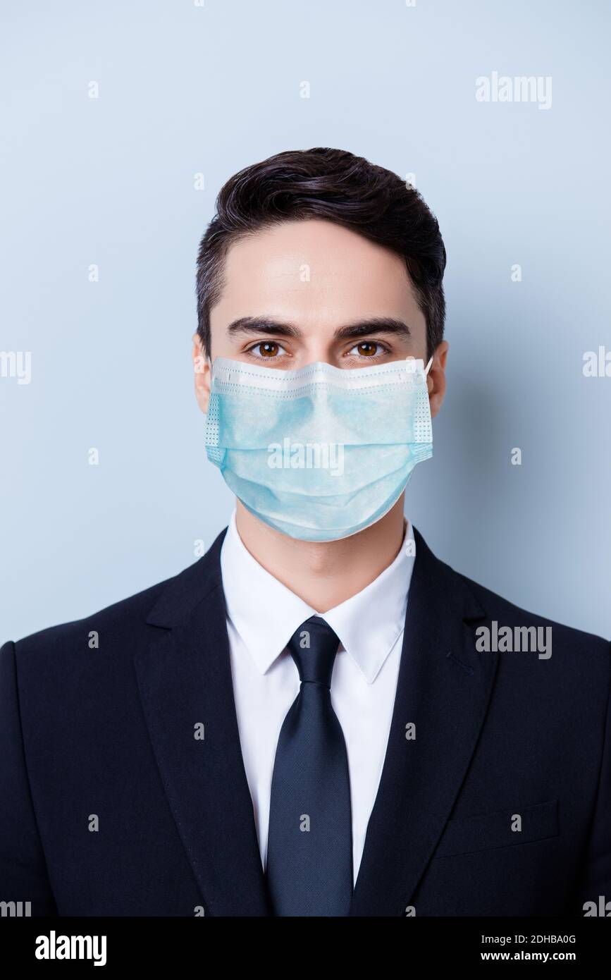 Vertical close-up portrait of classy expert guy wearing gauze safety ...